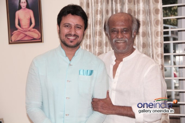 Rajinikanth blesses Telugu actor Raja Photos - FilmiBeat
