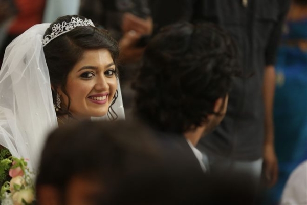 Chiranjeevi Sarja And Meghana Raj Christian Wedding Photos - FilmiBeat