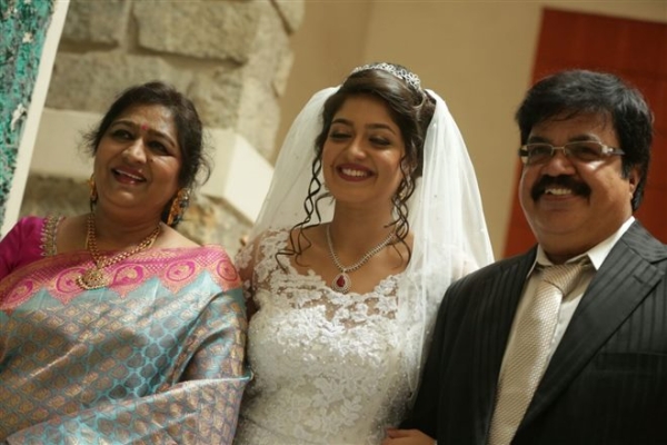 Chiranjeevi Sarja And Meghana Raj Christian Wedding Photos - FilmiBeat