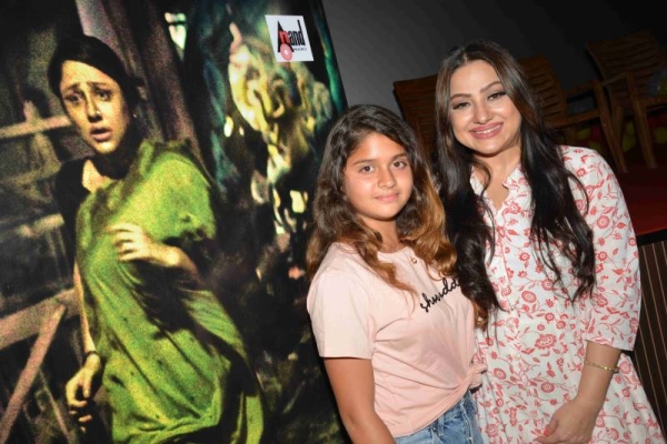 Devaki Movie Teaser Release Photos