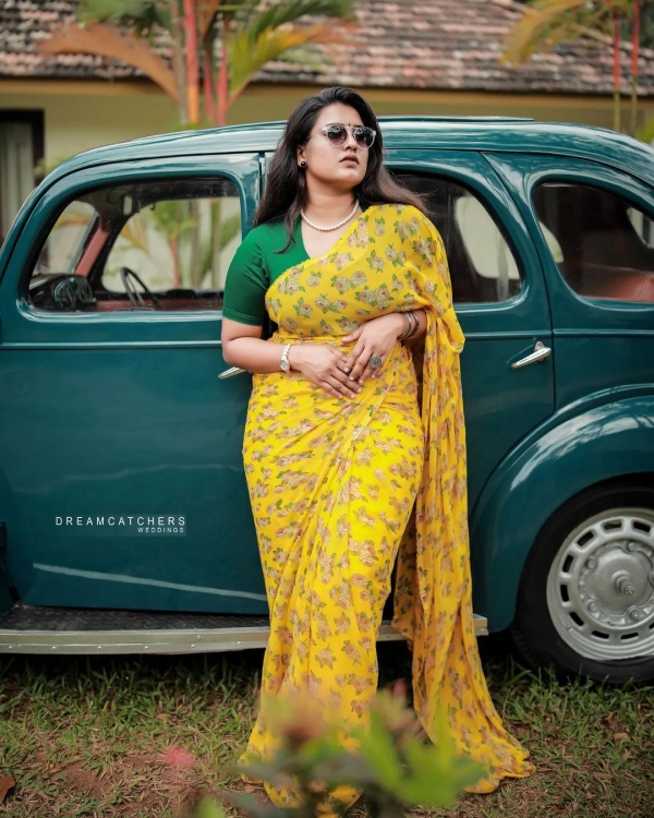 Malayalam Actress Roshna Ann Roy Latest Photoshoot in Yellow Saree ...