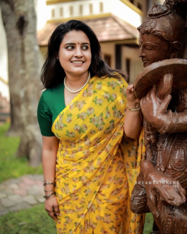 Malayalam Actress Roshna Ann Roy Latest Photoshoot in Yellow Saree ...