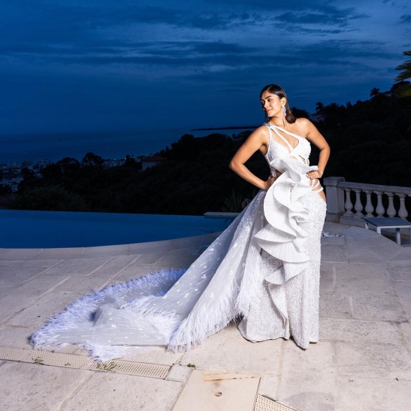 Cannes 2023: Mrunal Thakur makes a stunning debut in a cutout gown on ...